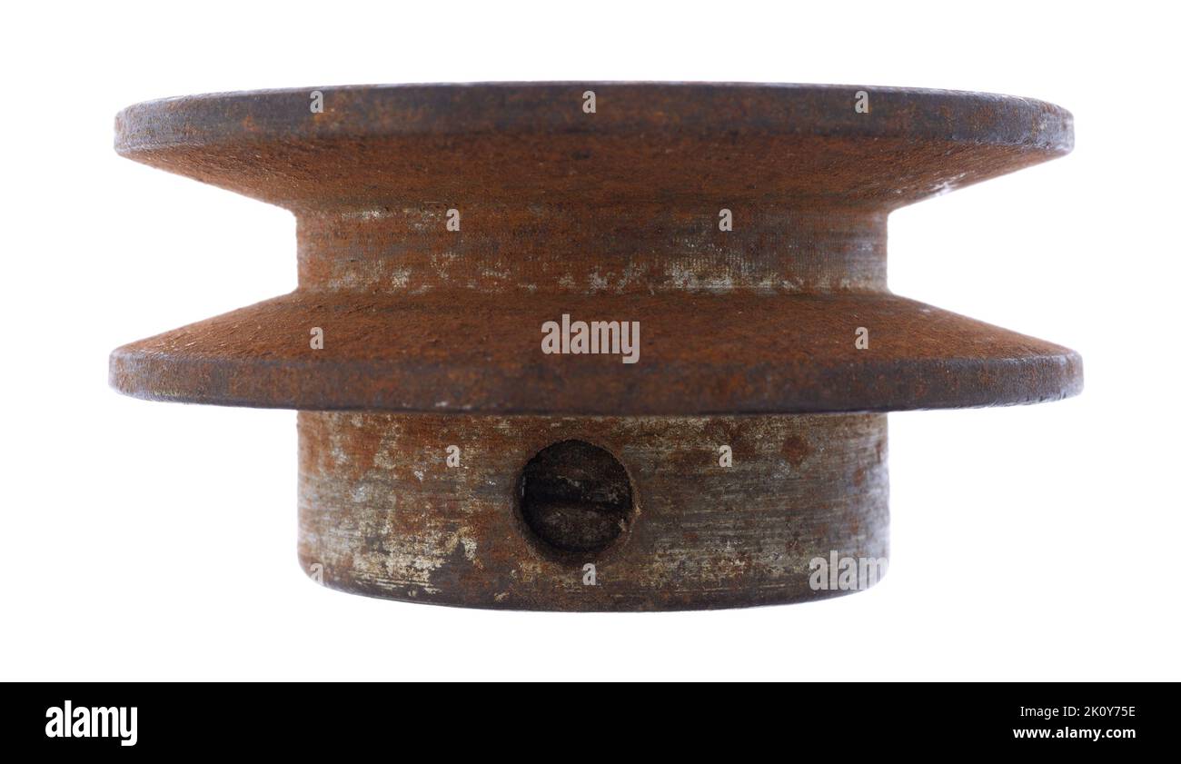 Side view of an old rusty pulley wheel with the screw for the key slot ...