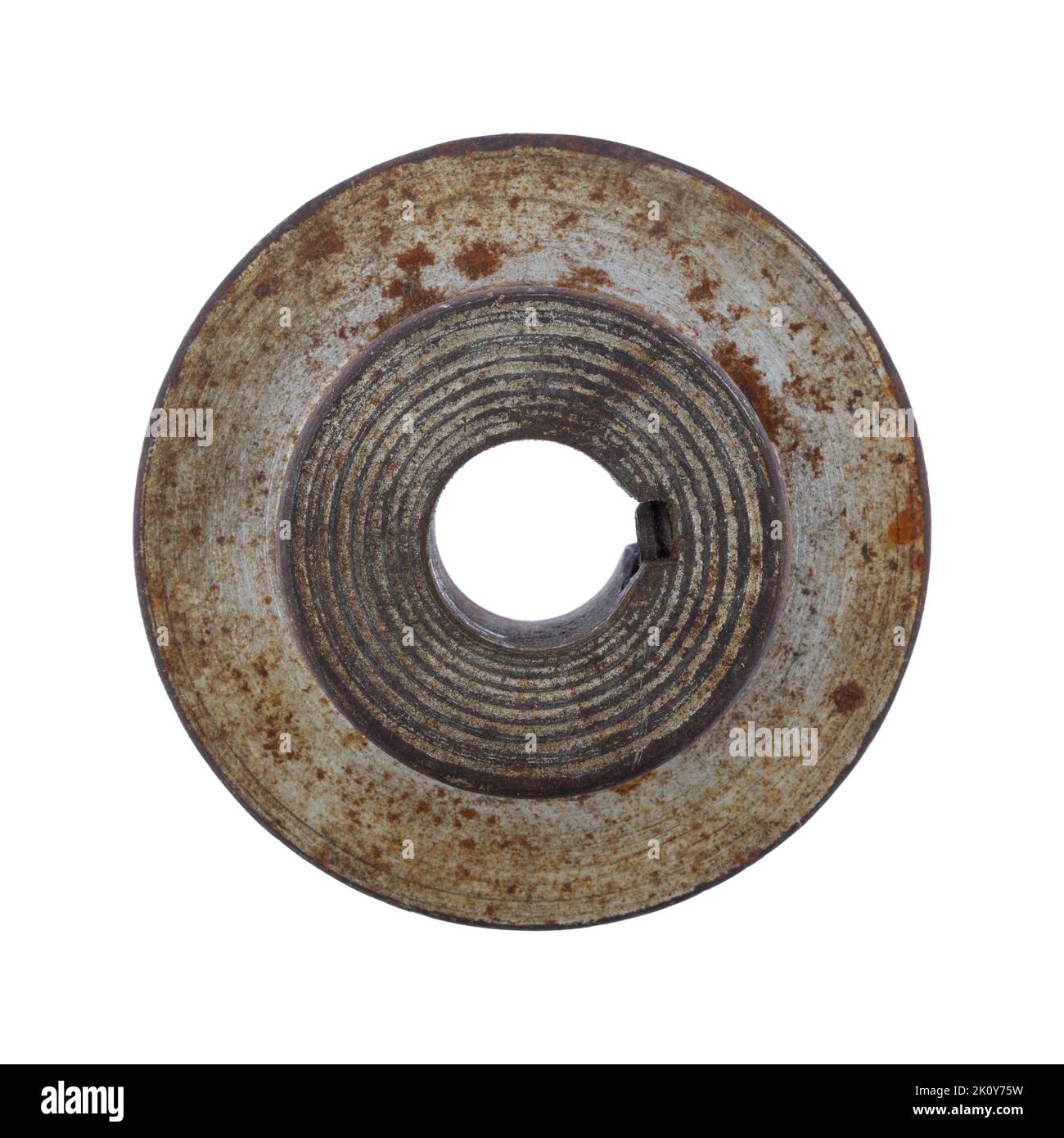 Overhead view of an old pulley wheel with the key slot isolated on a ...