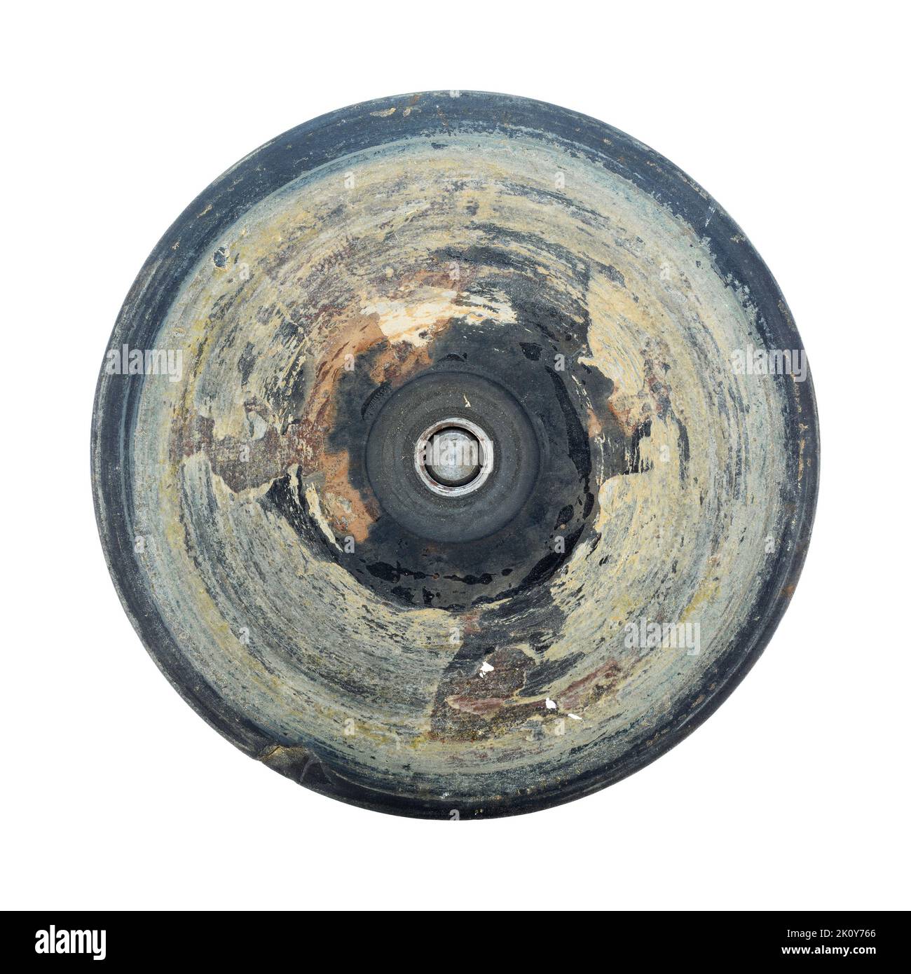 Overhead view of an old disc sander with adhesive residue isolated on a ...