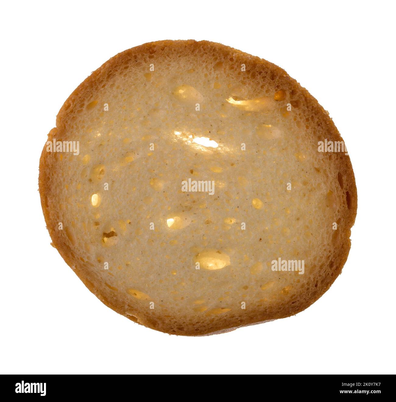 Top view of a single round toasted cracker isolated on a white ...