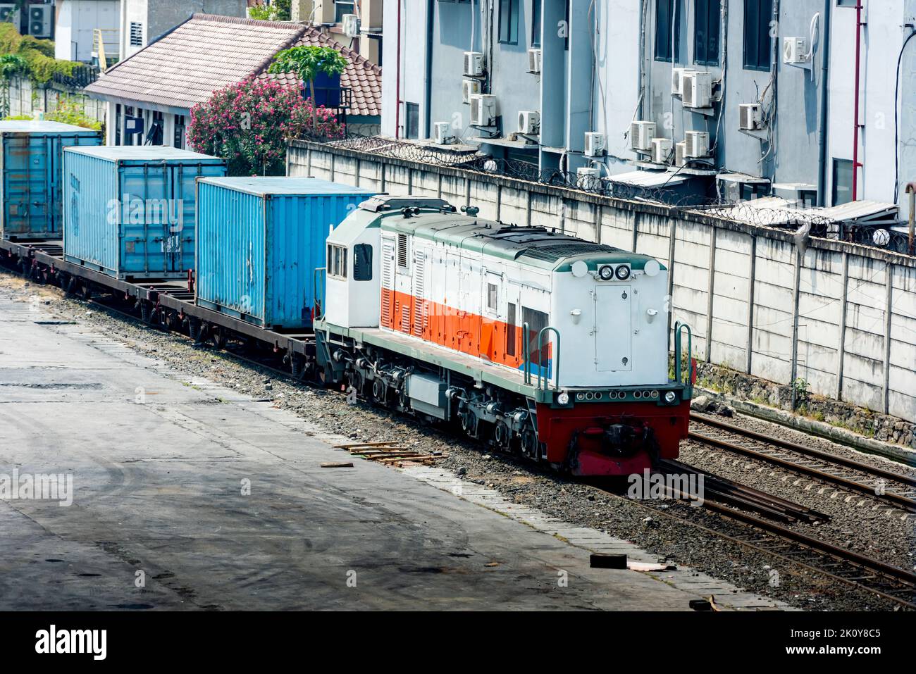 Freight train locomotive carrying with cargo with blue sky background ...