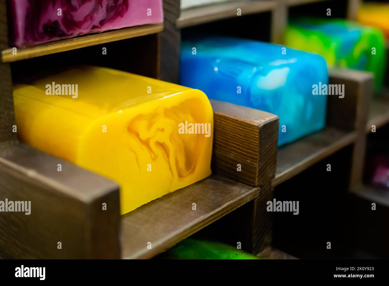 Handmade multicolored natural soap on counter of eco-friendly shop ...