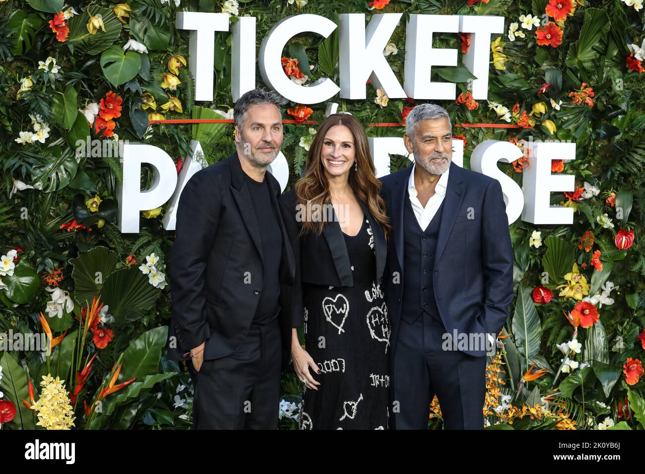 Ol Parker, Julia Roberts and George Clooney seen attending the world ...