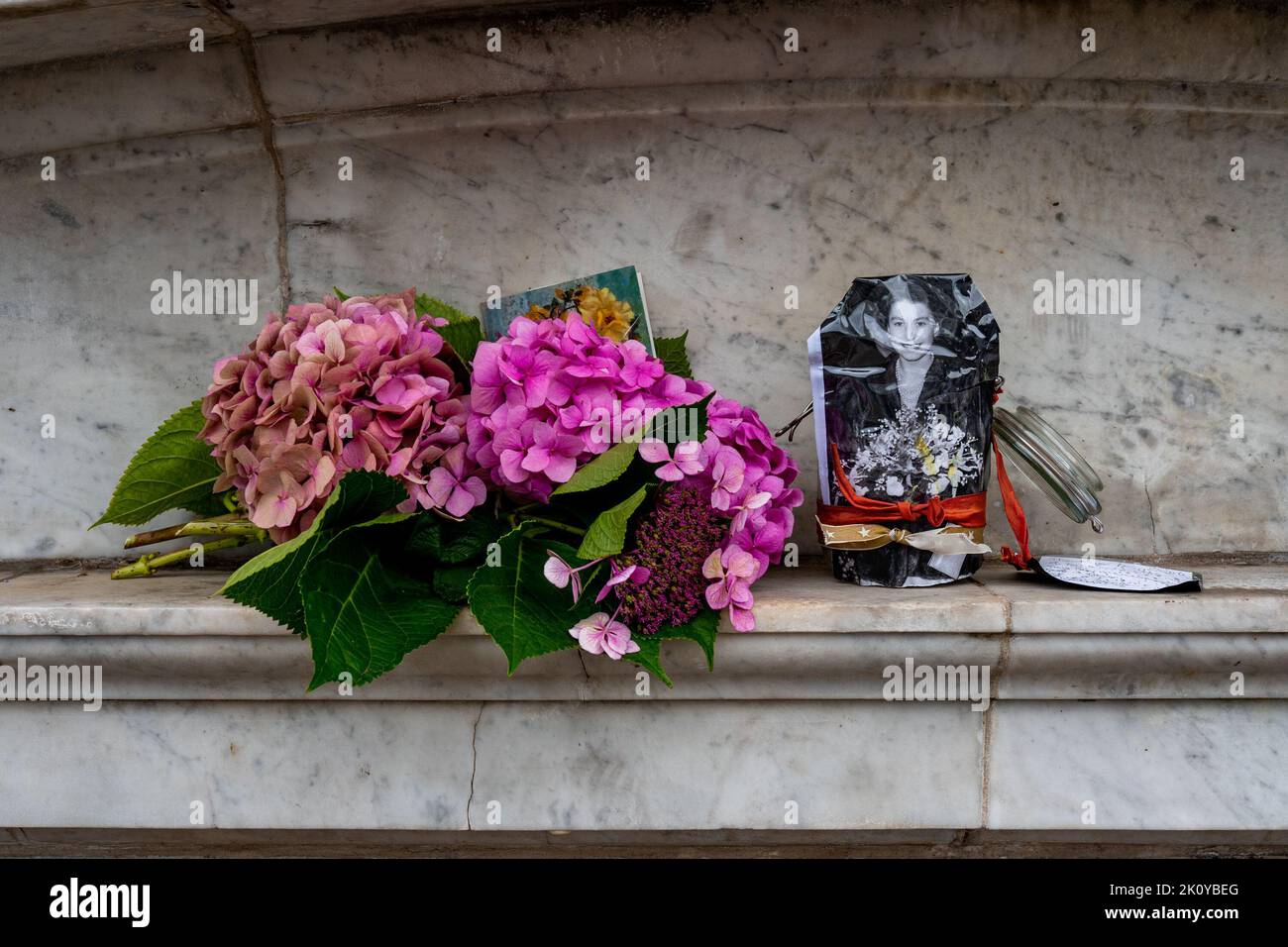A floral tribute on the Victoria Memorial the day after the death of ...