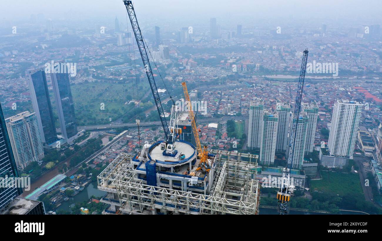 Top down view on different sky scrapers in a big city, fly over Stock ...