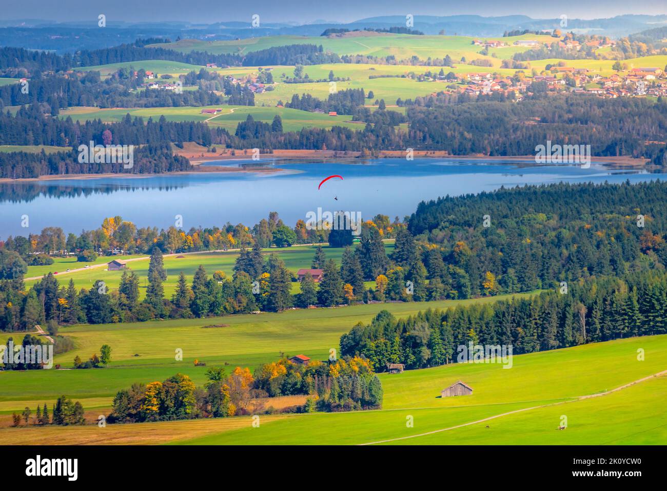 Bavaria countryside with lake, farms and village near Fussen, German ...