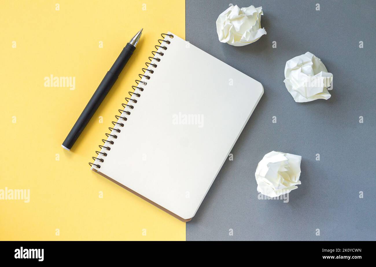 Open blank notepad, pen and crumpled paper on office desk. Education or ...