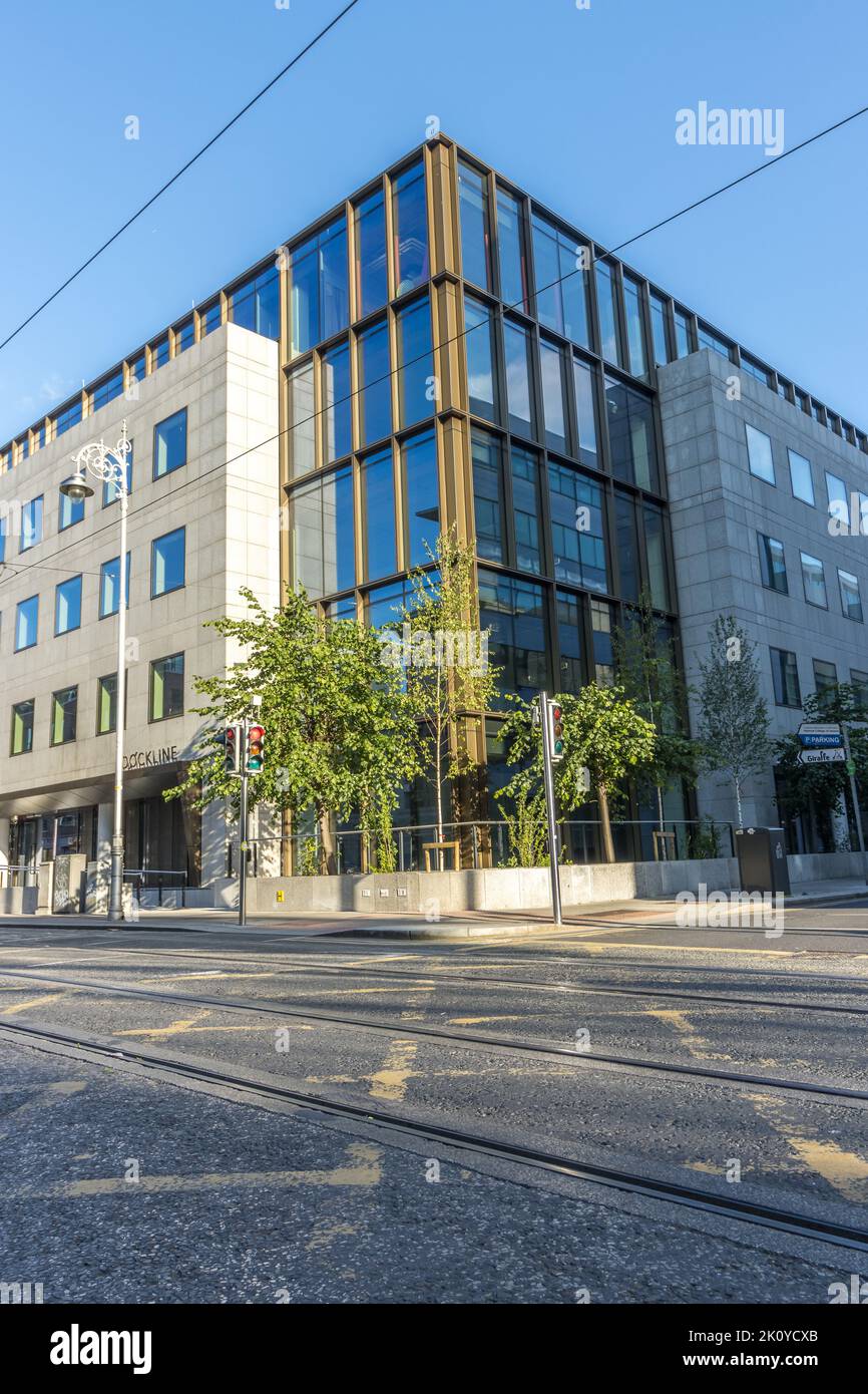 The corner view of the modern building of Dockline with metal and glass ...