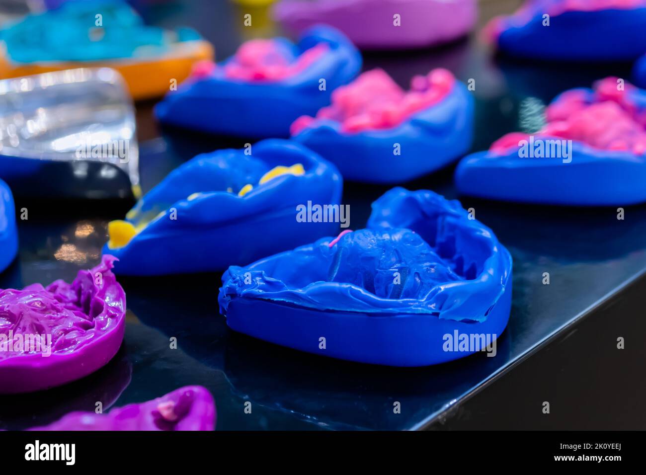 Different dental impressions at medical exhibition Stock Photo - Alamy