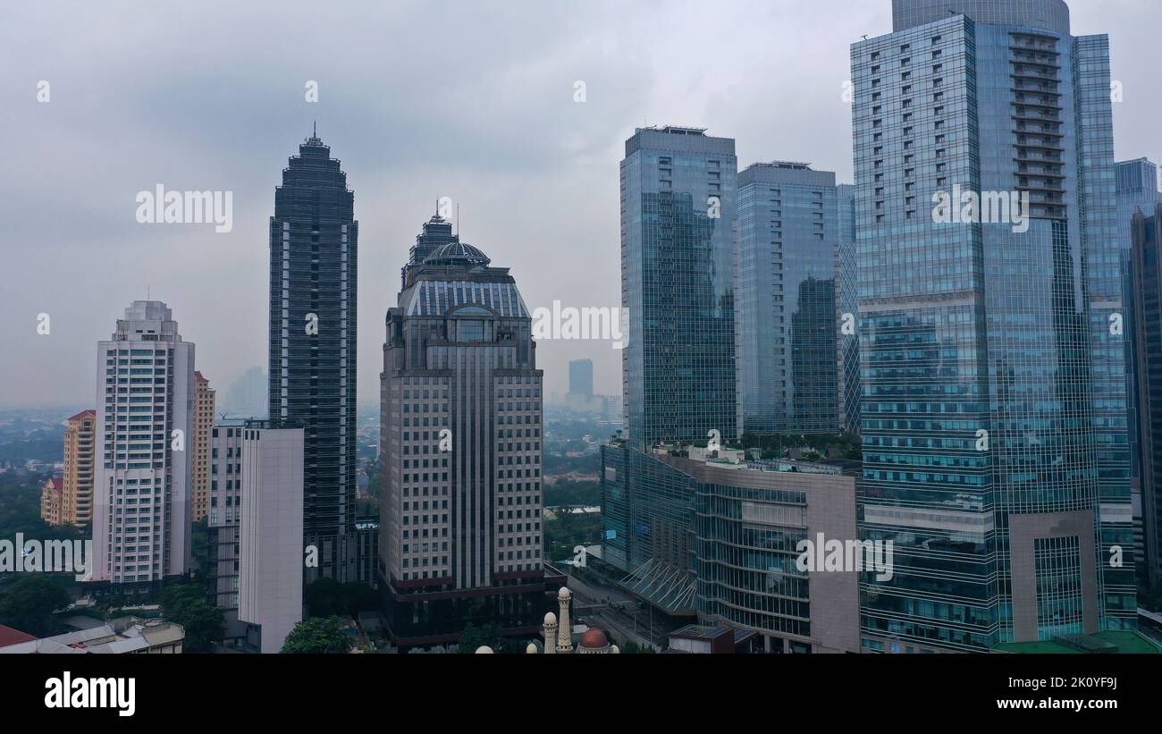Beautiful aerial view of misty morning covered skyscrapers and housing ...