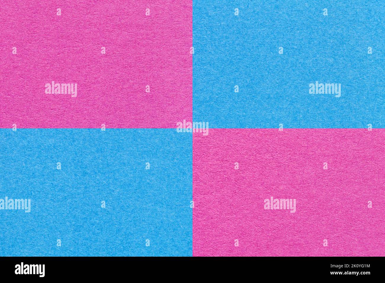 Texture of craft bright blue and purple paper background with cells ...