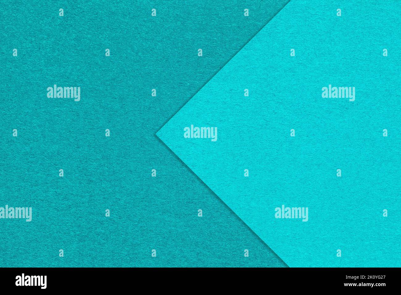 Texture of dark cyan and cerulean paper background, half two colors ...