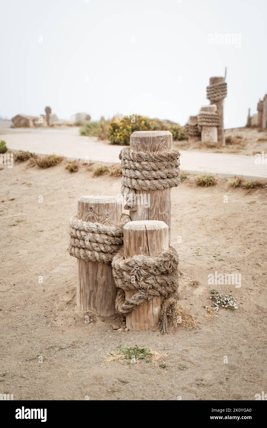 old style Wooden Mooring post with rope in Morro bay California ...