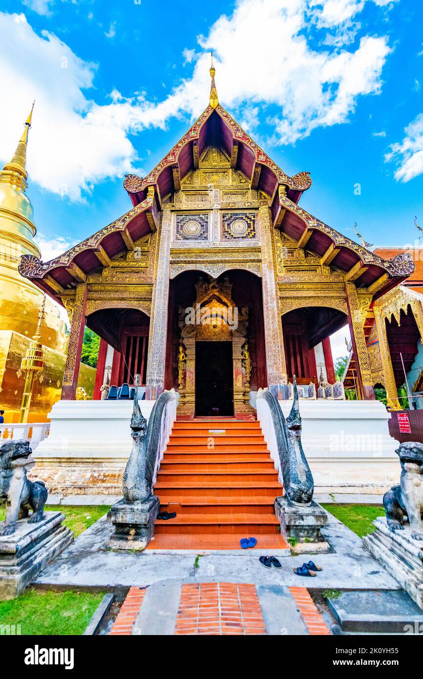 Wat Phra Singh temple in Chiang Mai city, Thailand. Wooden building is ...