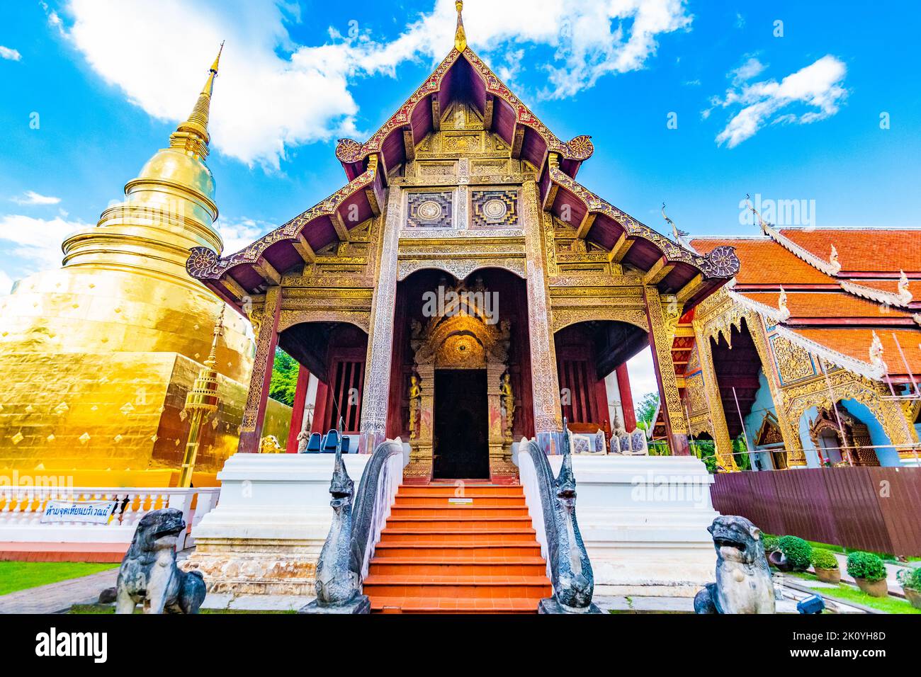 Wat Phra Singh temple in Chiang Mai city, Thailand. Wooden building is ...