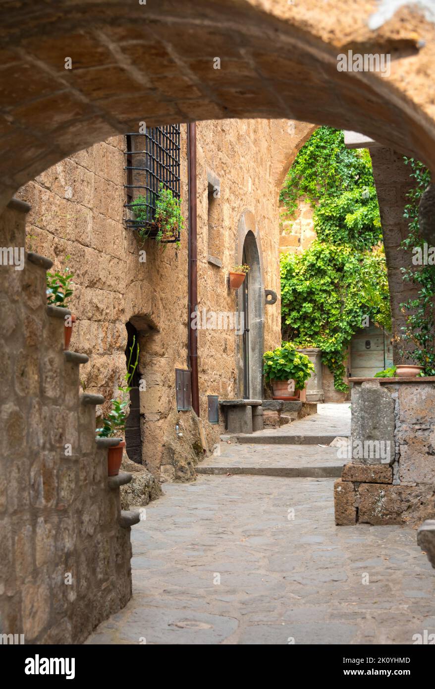 Picturesque building in medieval town in Tuscany. Old stone walls and ...