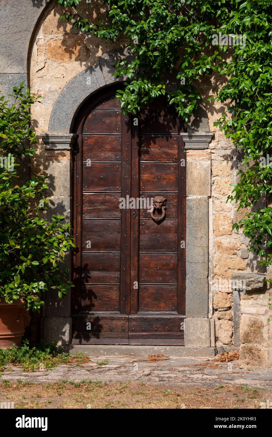 Picturesque building in medieval town in Tuscany. Old stone walls and ...
