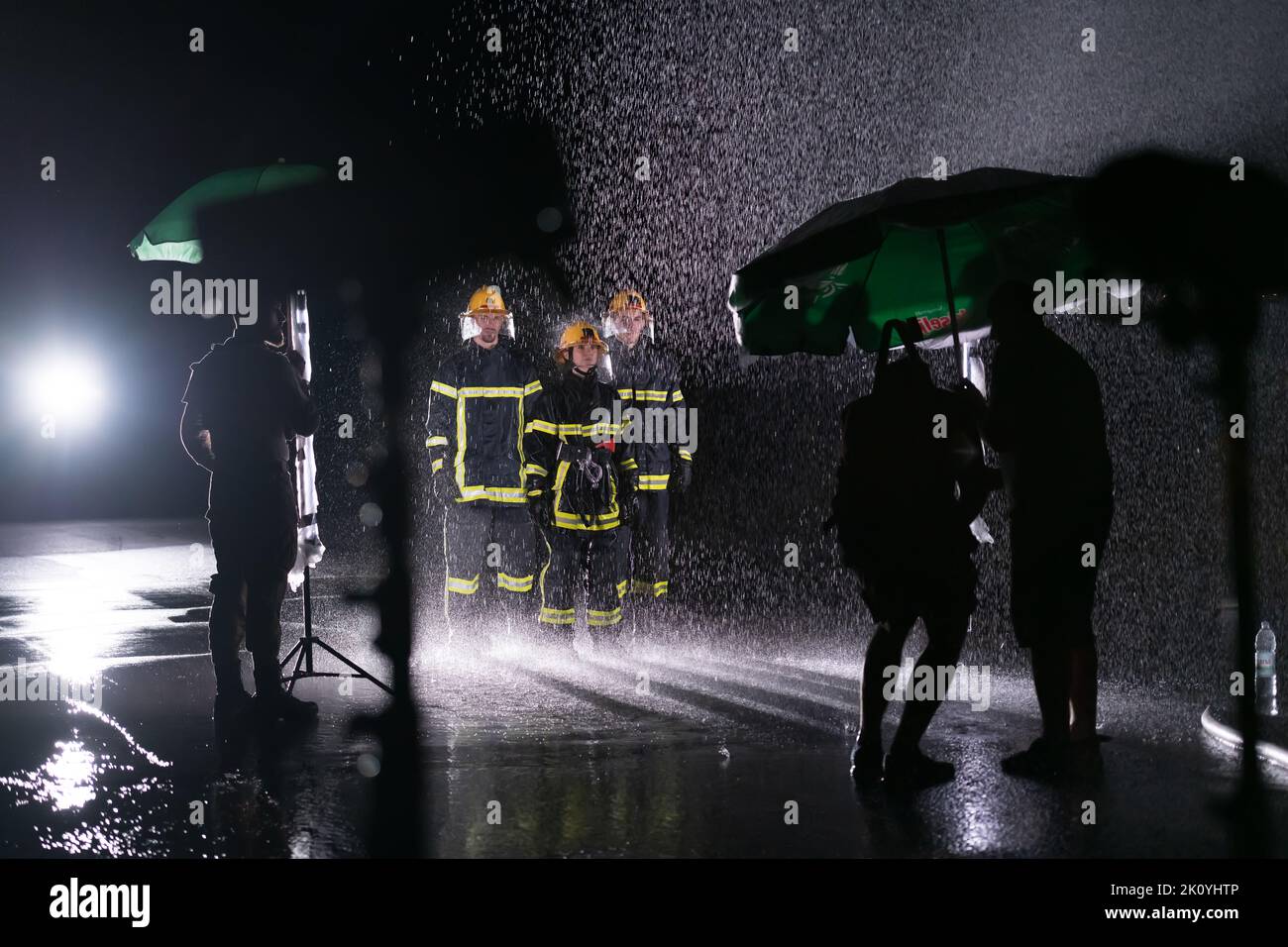Behind the scene of Firefighters photo and cinema set with rain use a ...