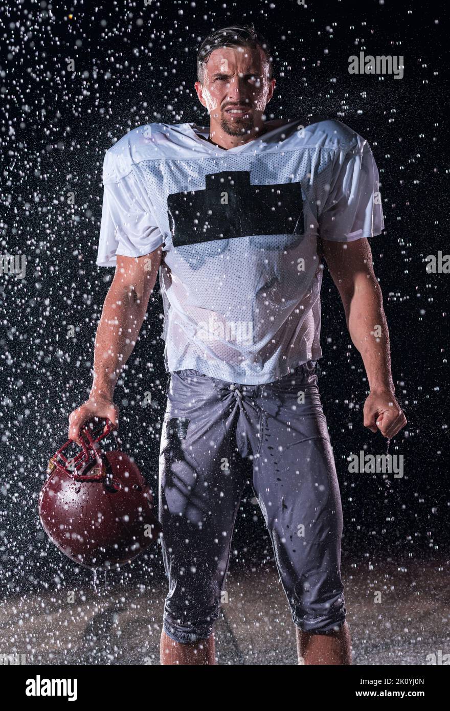 American Football Field: Lonely Athlete Warrior Standing on a Field ...