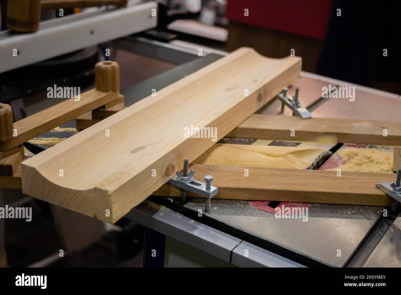 Carpenter workbench with industrial circular saw machine, wooden boards ...