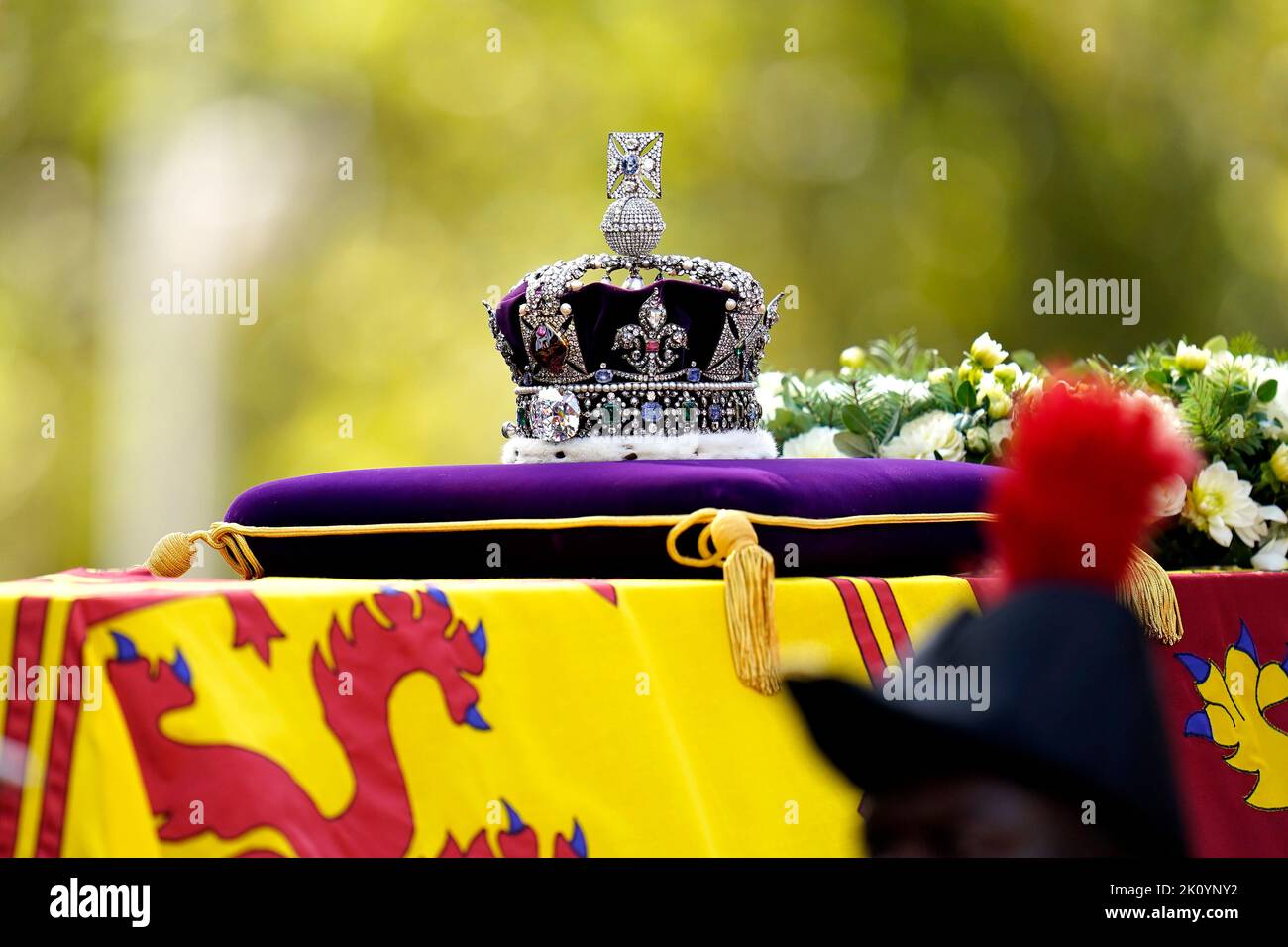 The coffin of Queen Elizabeth II, draped in the Royal Standard with the ...