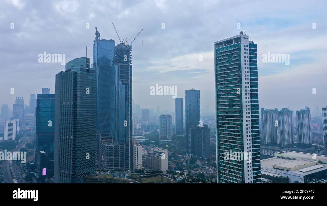 Aerial view of office buildings in Jakarta central business district and noise cloud Stock Photo ...