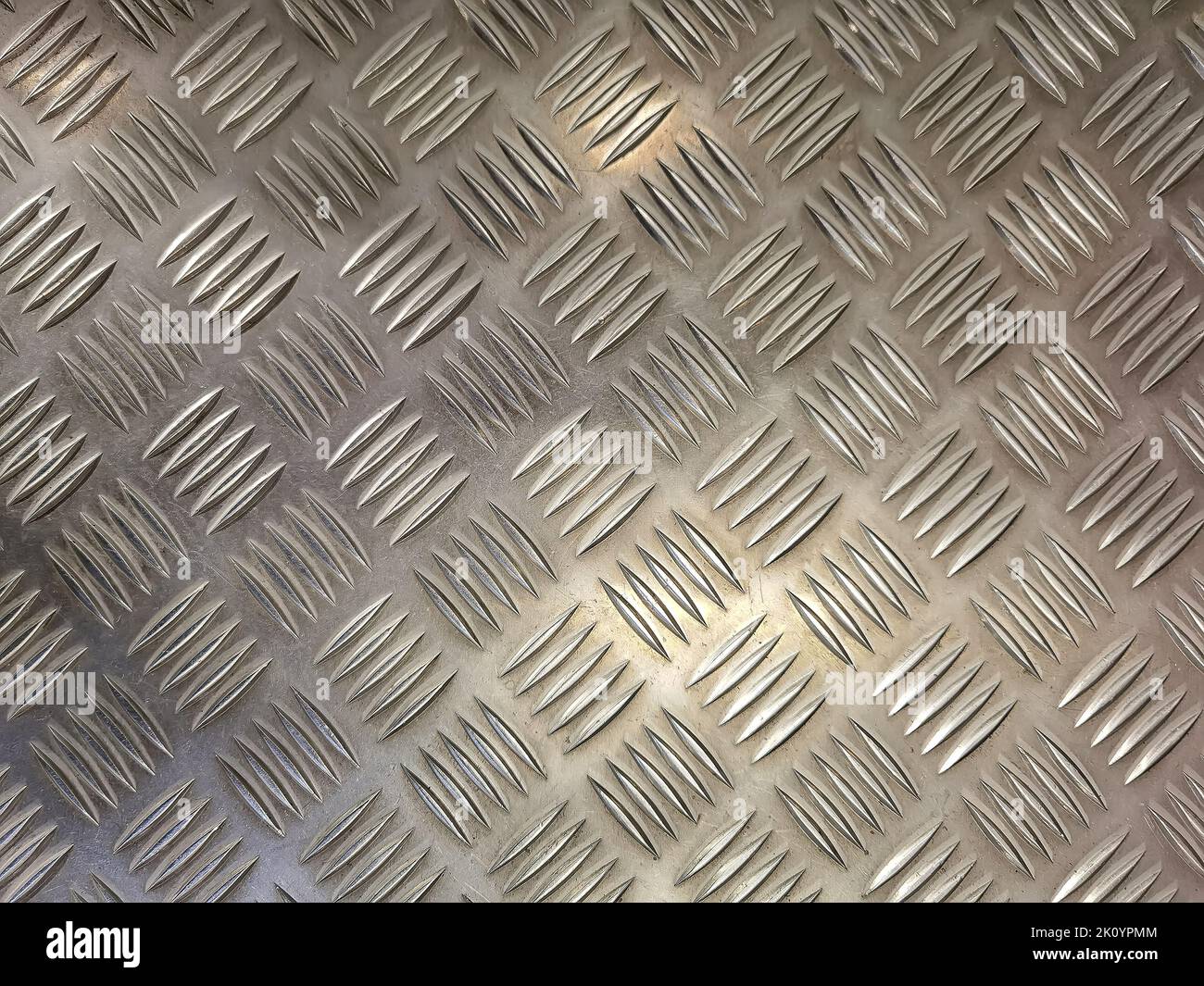 shiny metal texture with diamond pattern. stainless steel background ...