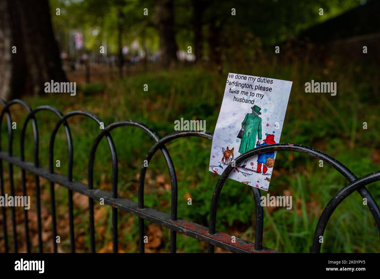 A drawing of Queen Elizabeth II and Paddington Bear by the gates of St ...