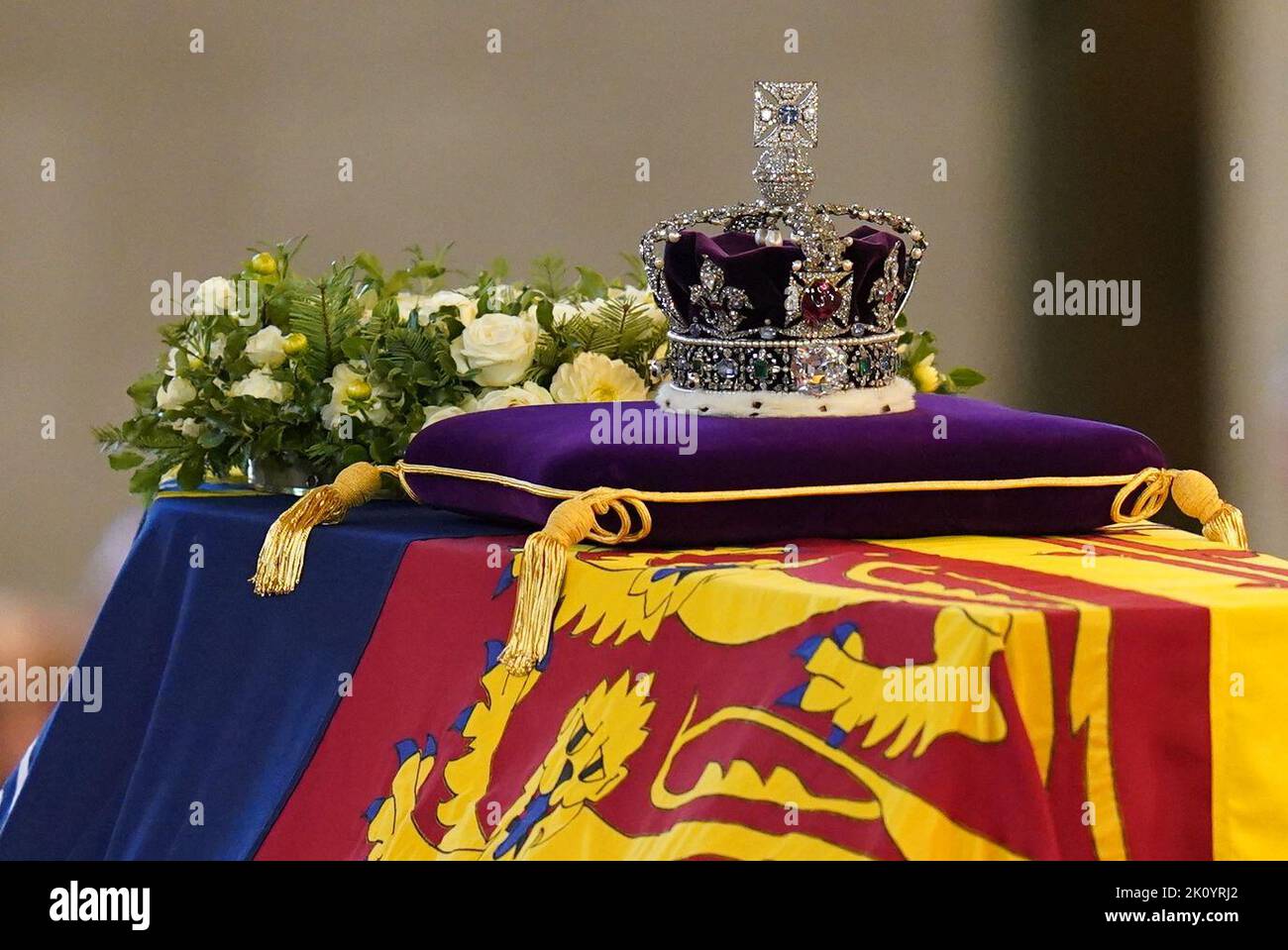 The coffin of Queen Elizabeth II, draped in the Royal Standard with the ...
