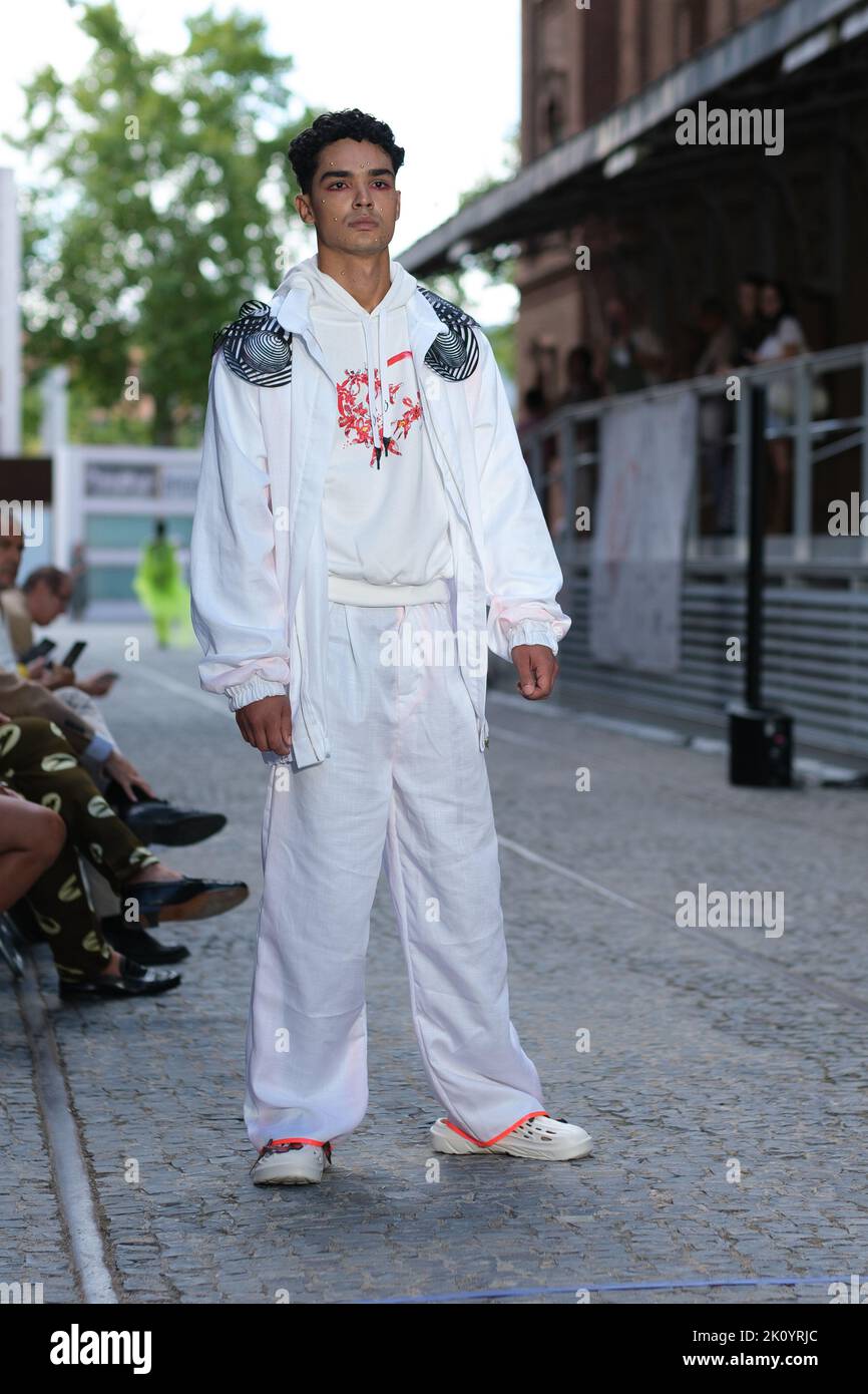 Madrid, Spain. 14th Sep, 2022. A model walks the runway wearing a ...