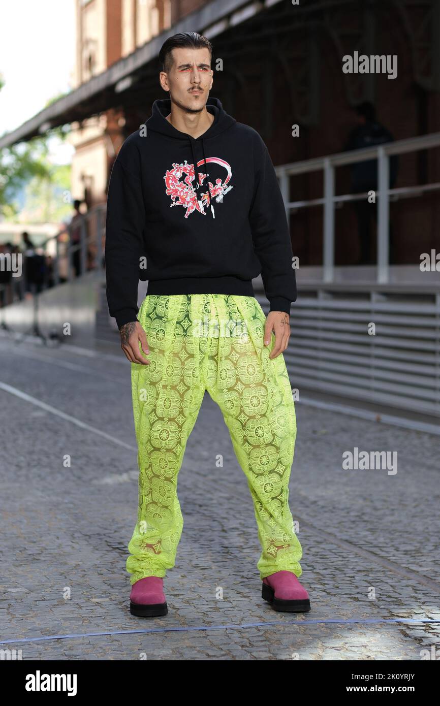 Madrid, Spain. 14th Sep, 2022. A model walks the runway wearing a ...