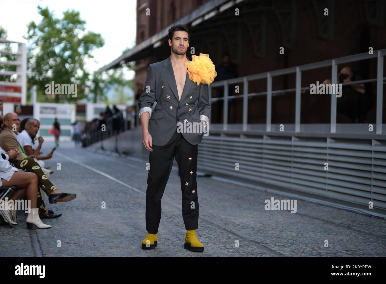 Madrid, Spain. 14th Sep, 2022. A model walks the runway wearing a ...