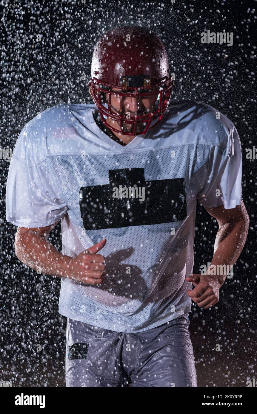 American Football Field: Lonely Athlete Warrior Standing on a Field ...