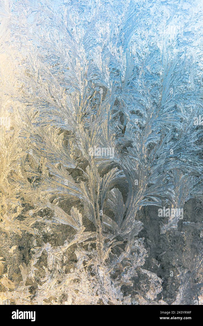 Frozen winter window with shiny ice frost pattern texture. Christmas ...