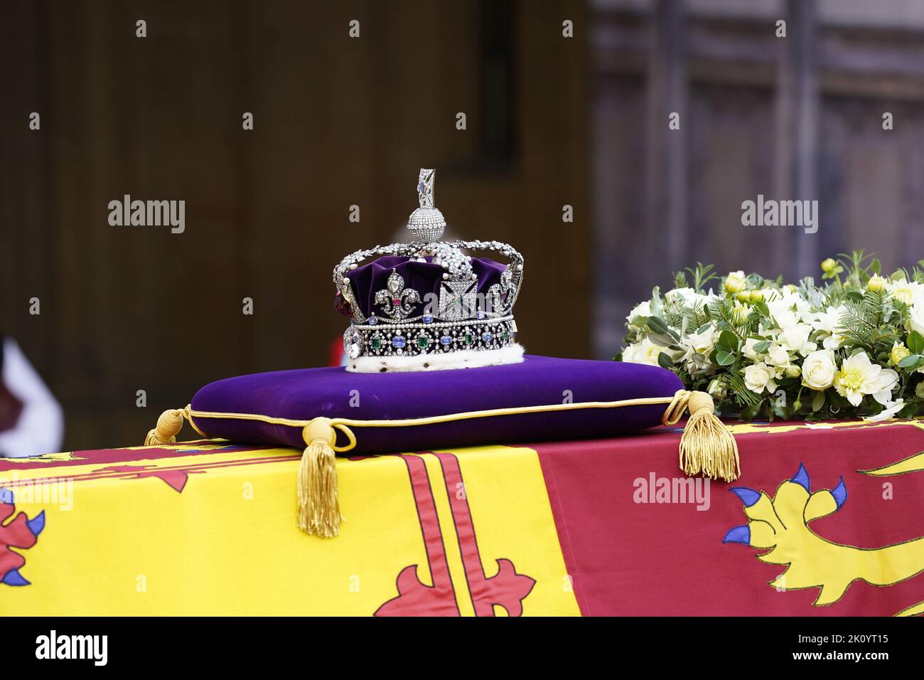 The coffin of Queen Elizabeth II draped in the Royal Standard with the ...
