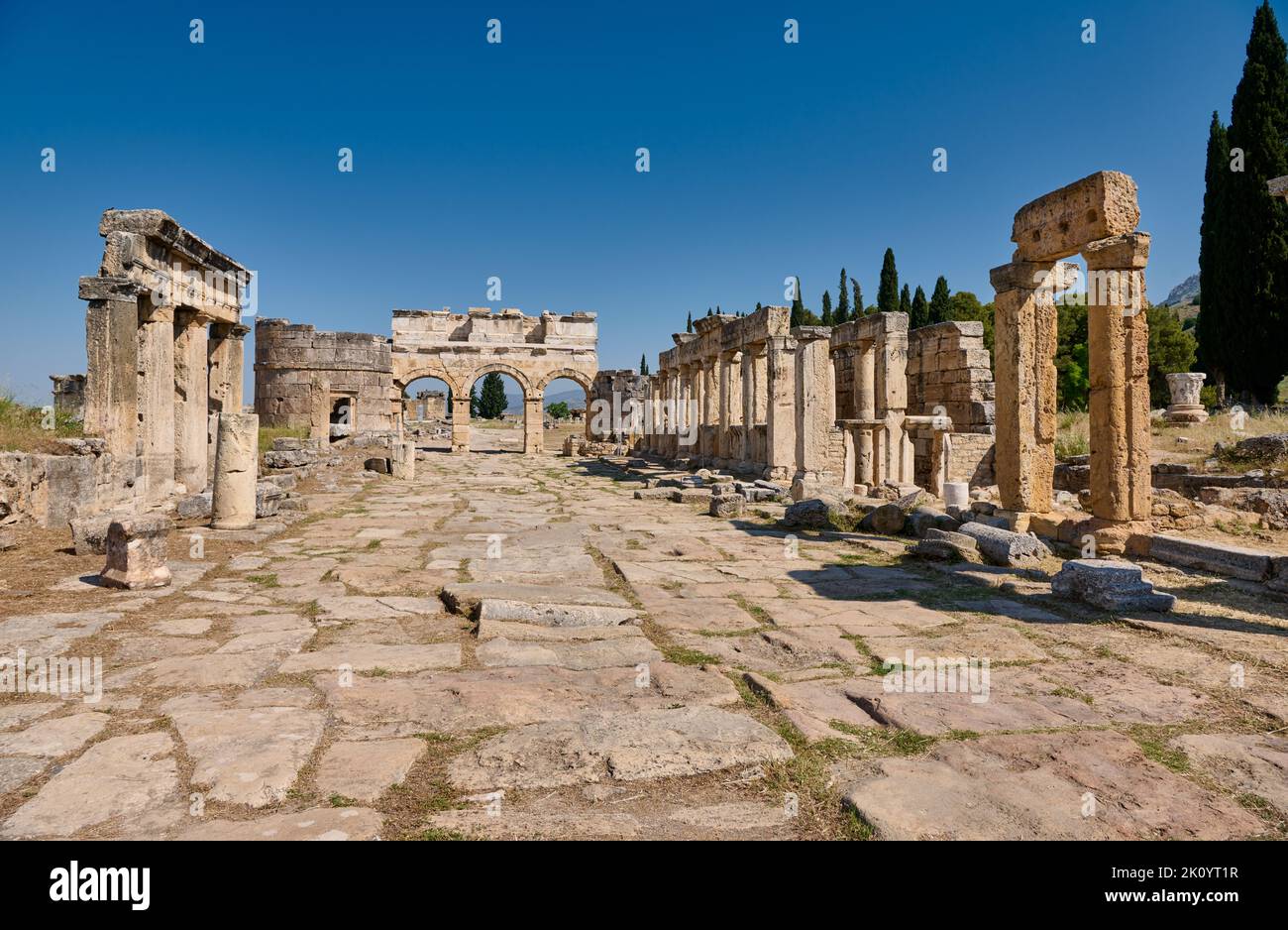 main street with Frontinus Gate or Nothern Gate in Greek Hierapolis ...