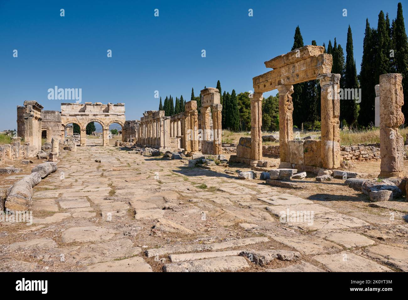 main street with Frontinus Gate or Nothern Gate in Greek Hierapolis ...