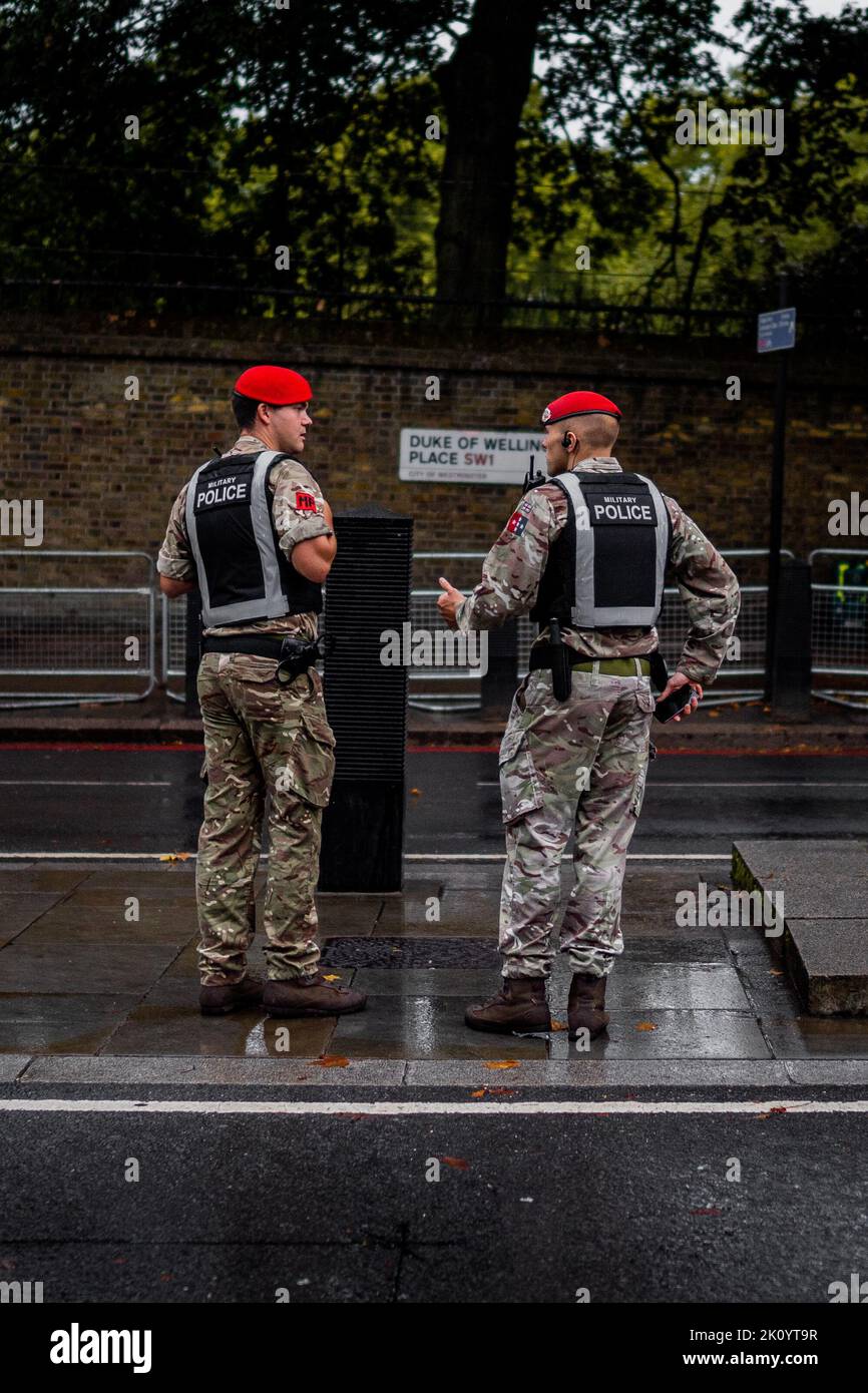 Military Police officers await the arrival of Queen Elizabeth II's ...