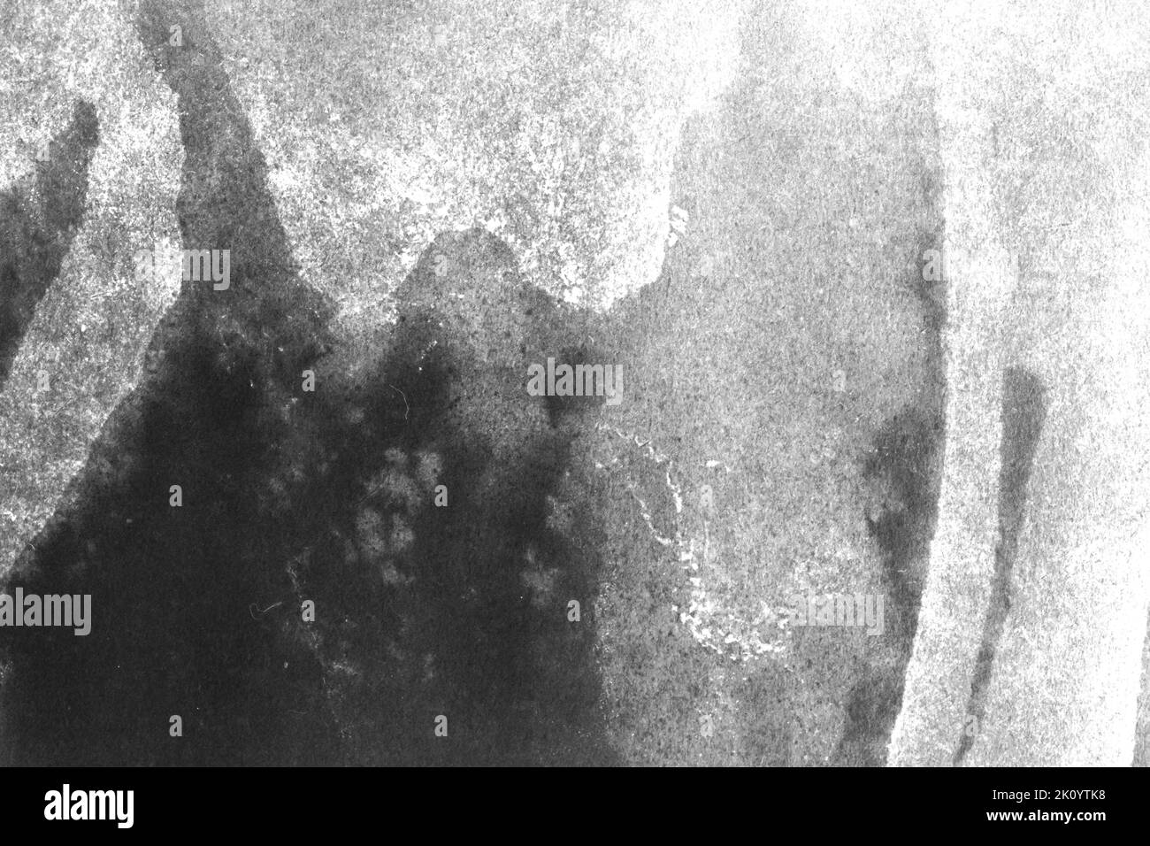 black and white texture of old paper with water stains as a background ...