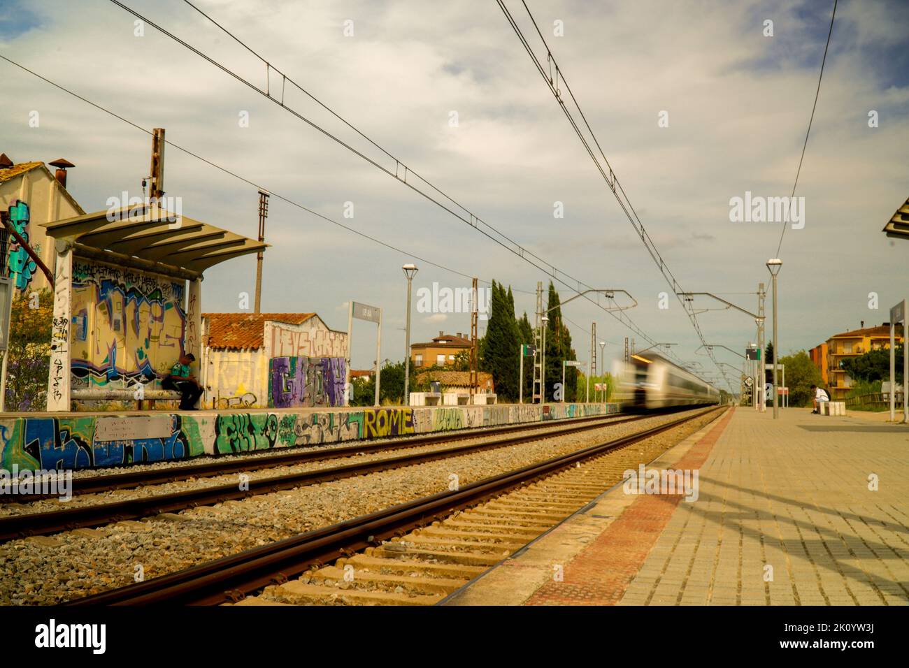 suburban train moving along the tracks at high speed Stock Photo - Alamy