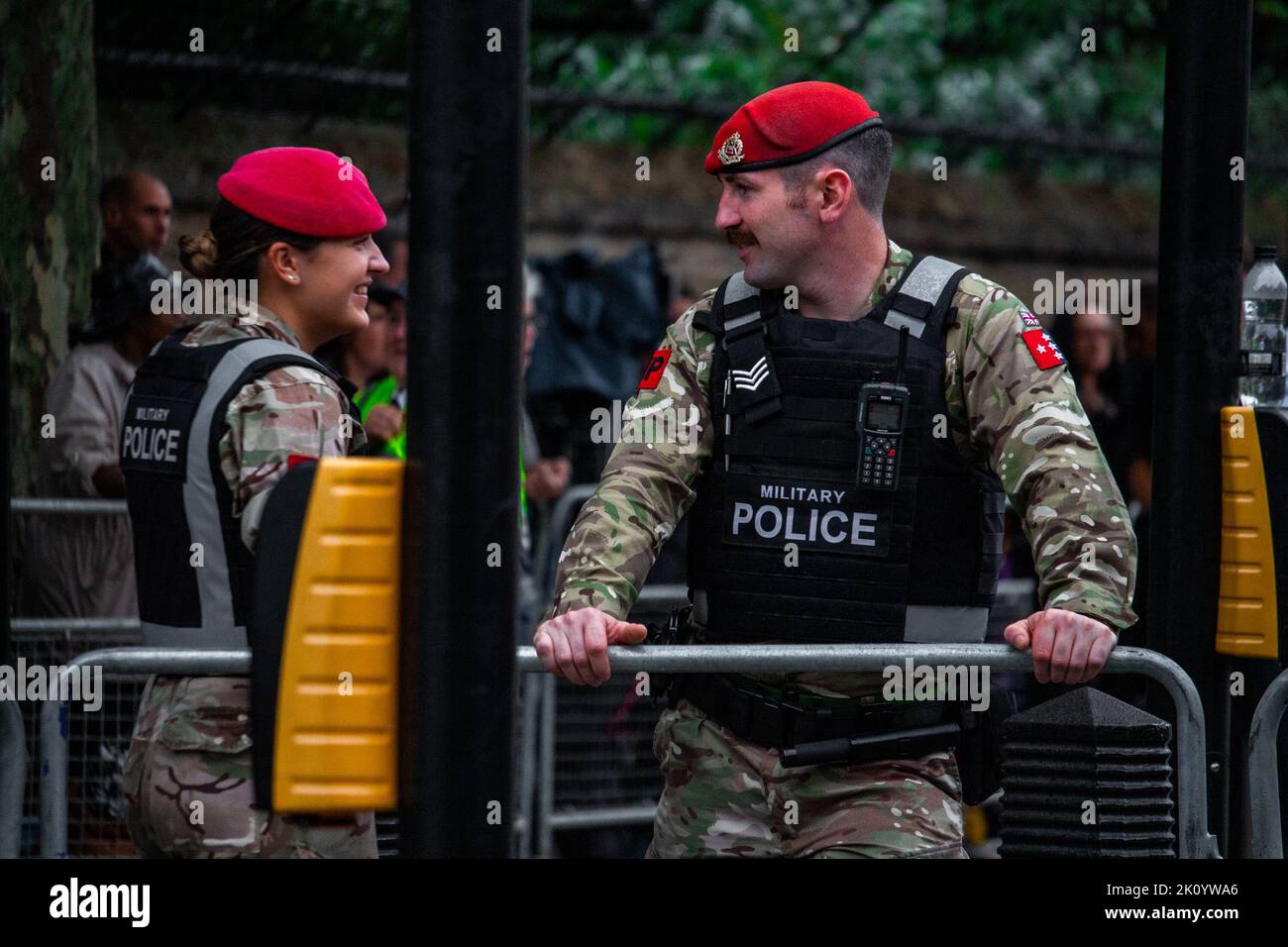 Military Police officers await the arrival of Queen Elizabeth II's ...