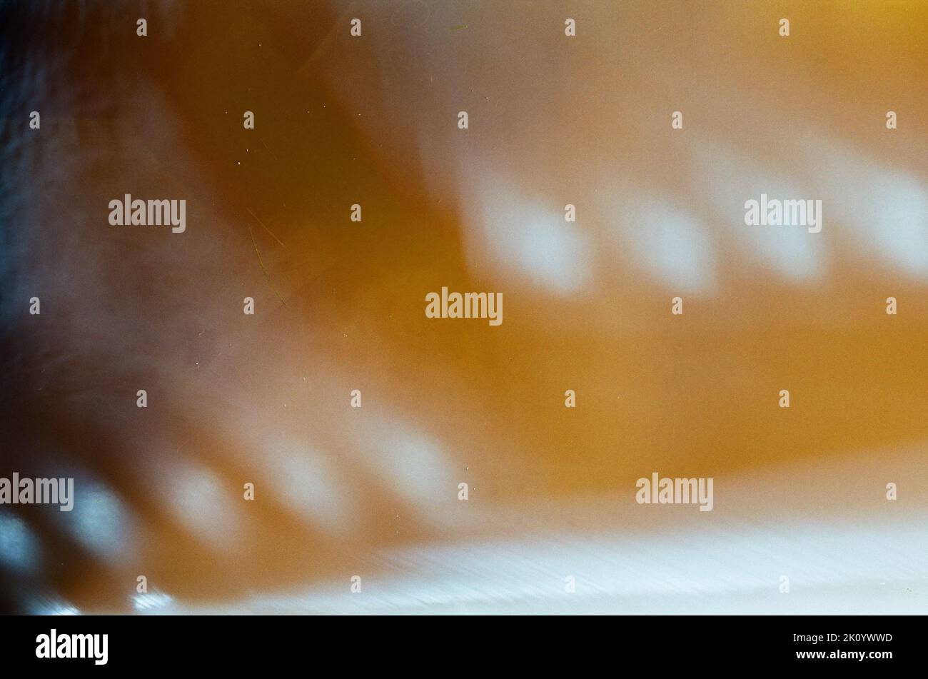 Pre-digital photography era concept. Blurred analog photograph burns in ...