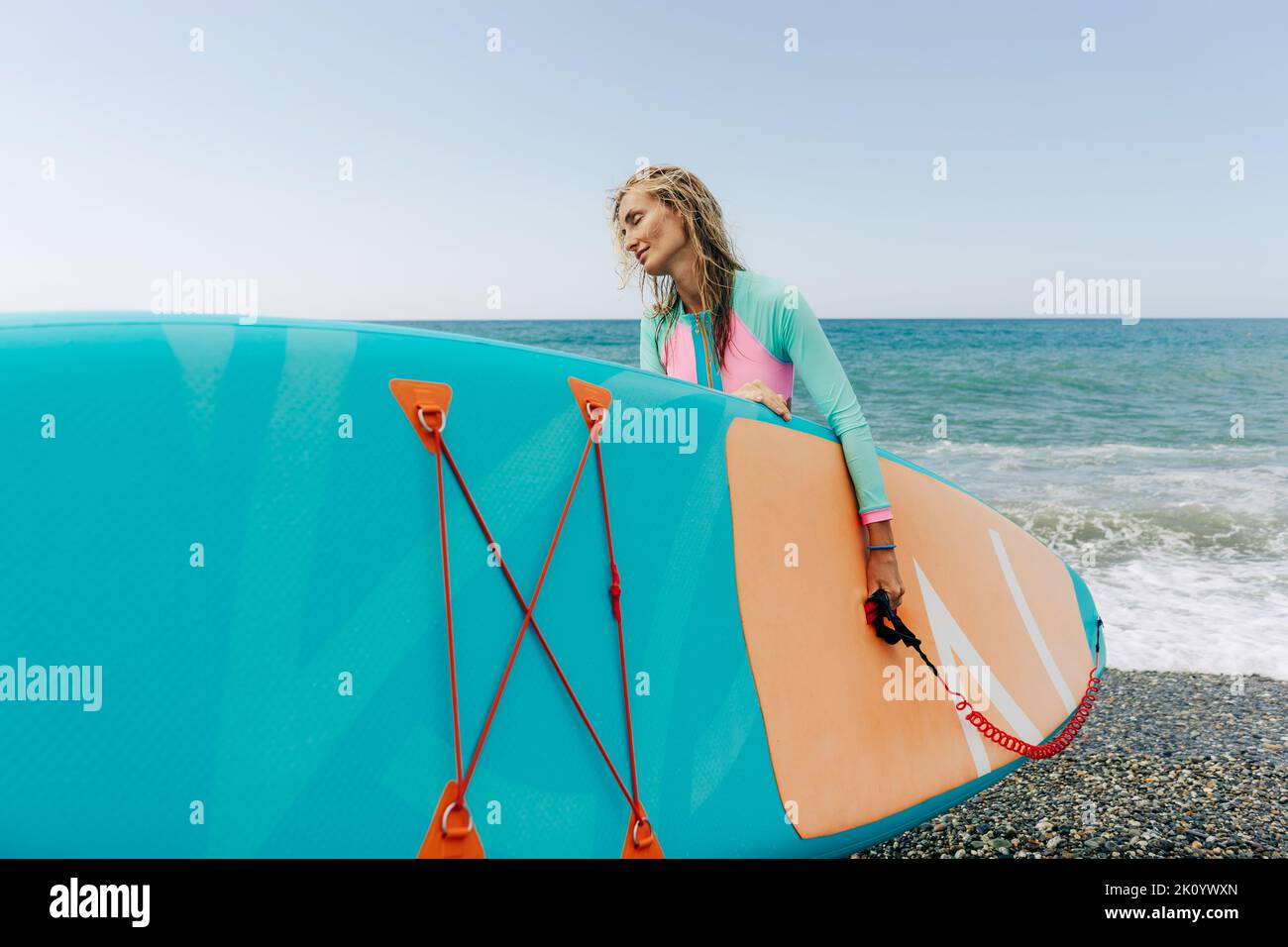 Paddleboard young blonde woman hi-res stock photography and images - Alamy