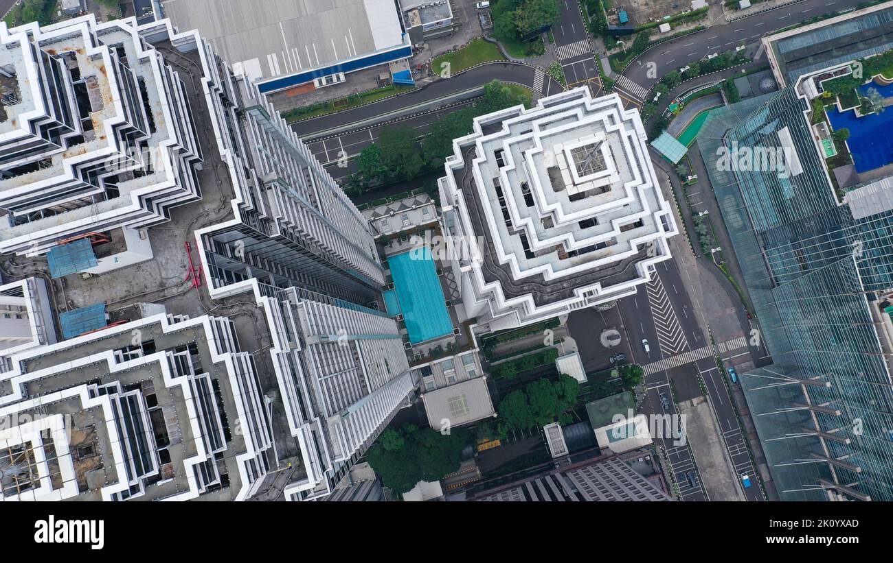 Top down view on different sky scrapers in a big city, fly over Stock ...