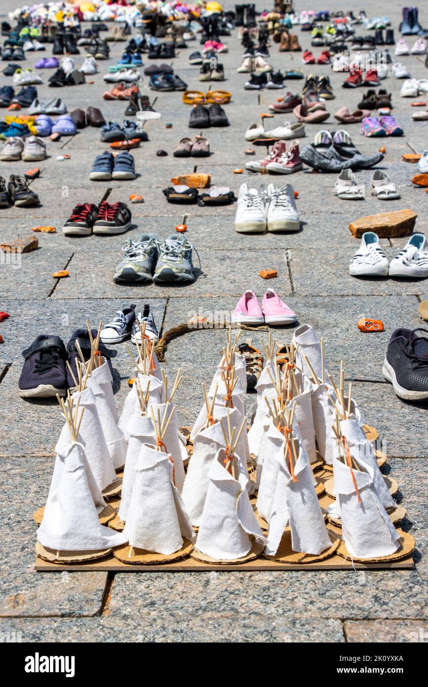 Every child matters. Many children shoes on the Ottawa's Parliament ...