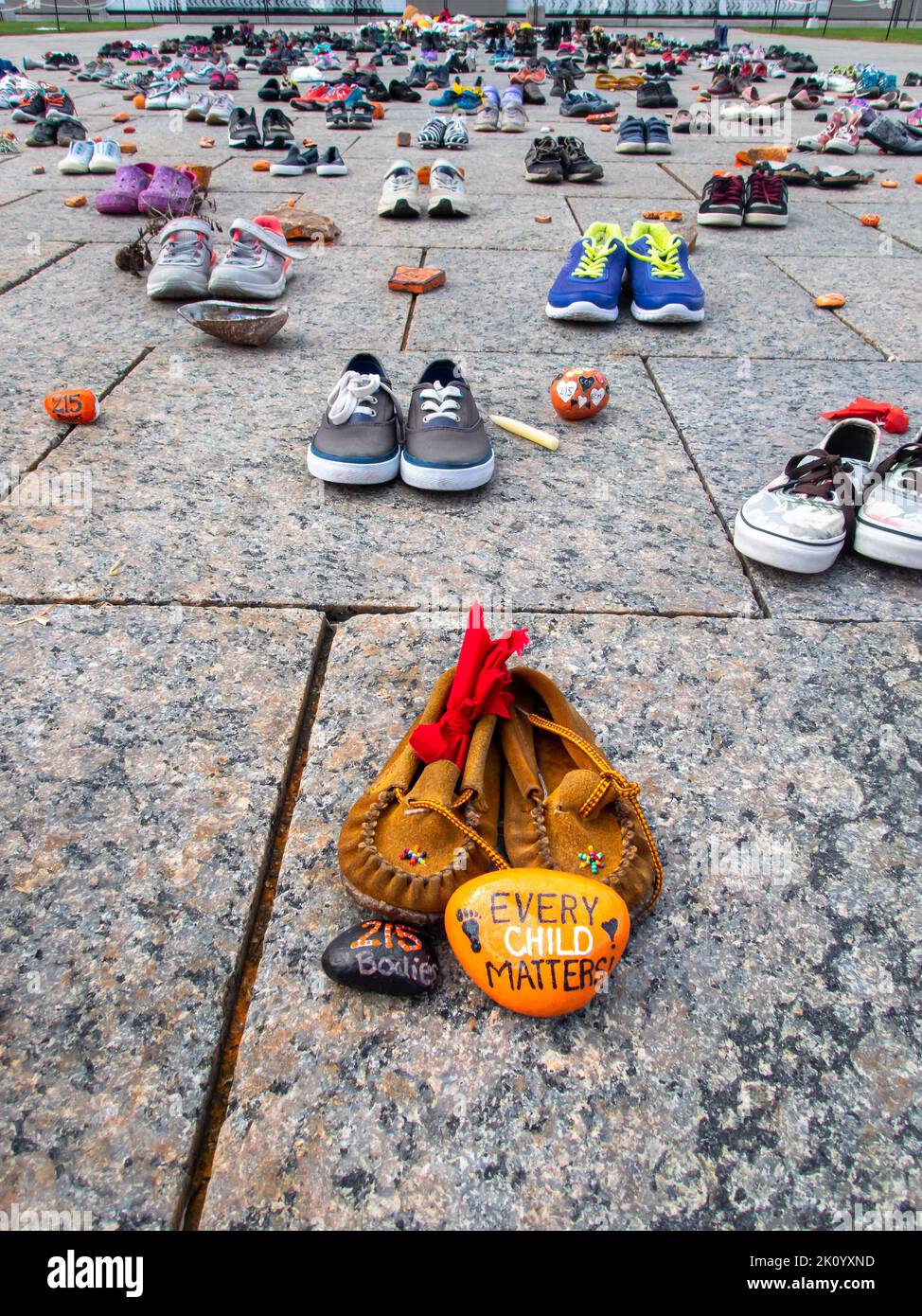 Every child matters. Many children shoes on the Ottawa's Parliament ...