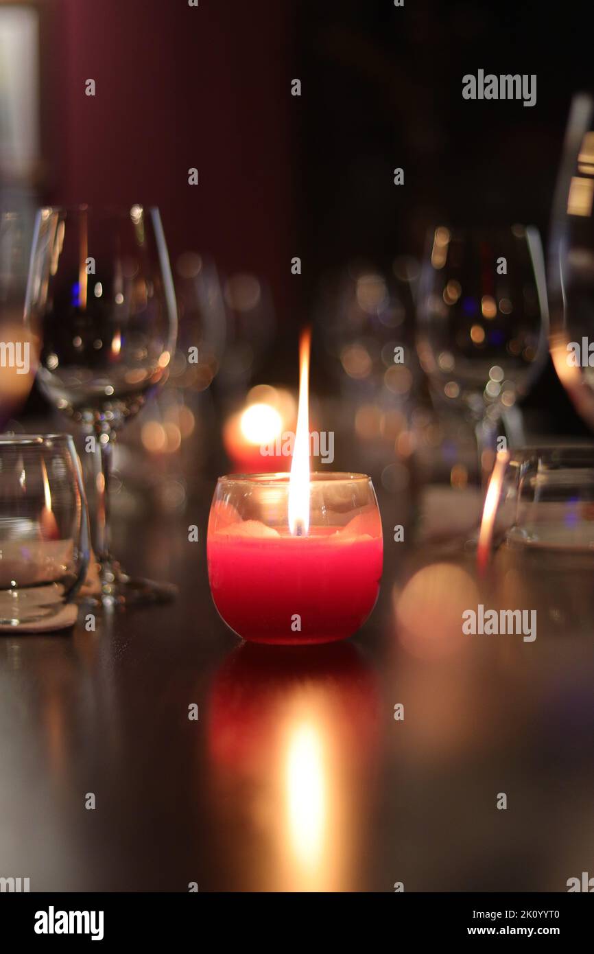 Red Candle light diner table Stock Photo - Alamy