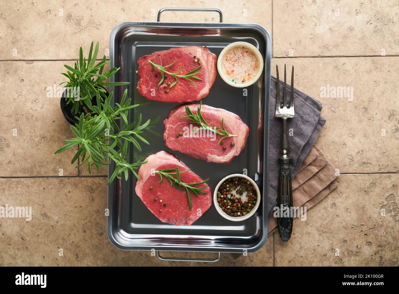 Steaks. Fresh Filet mignon Steaks with spices rosemary and pepper in ...