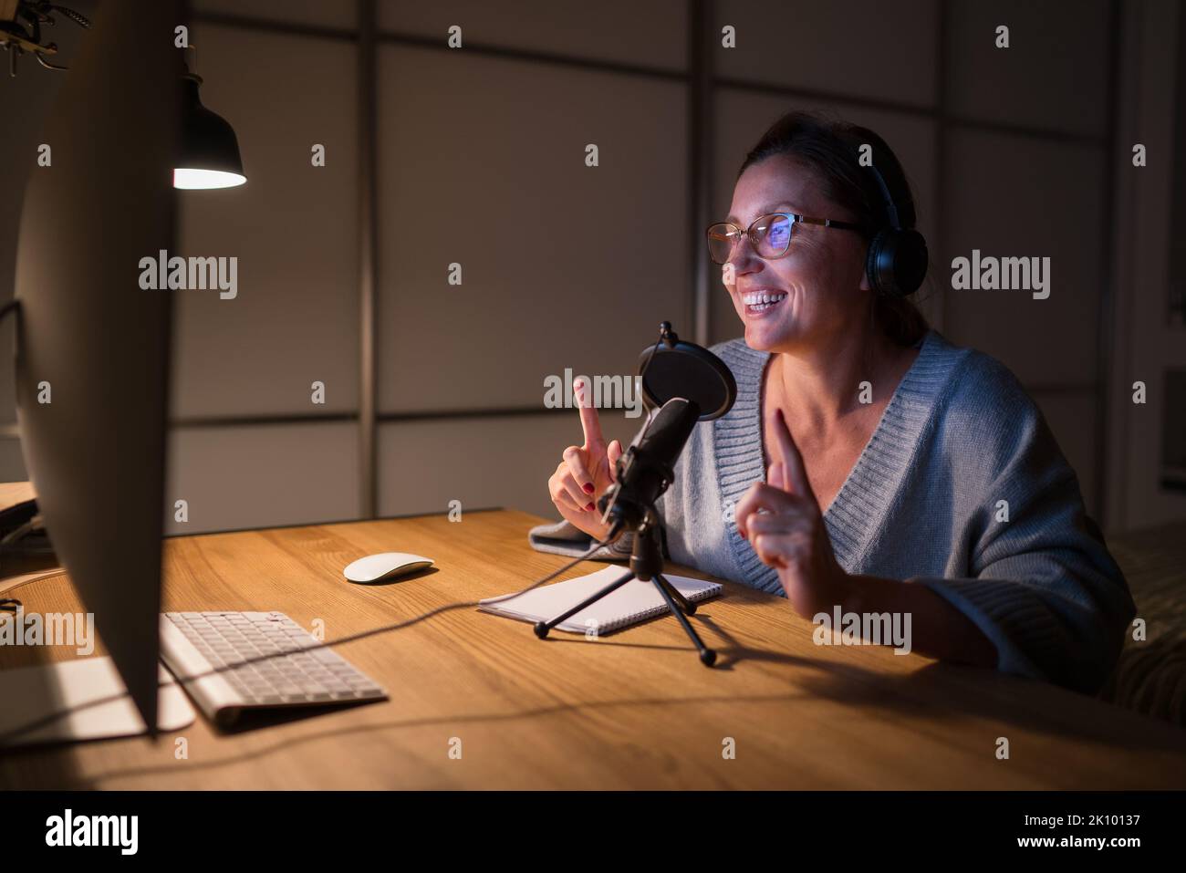 Communication mic woman in hi-res stock photography and images - Alamy