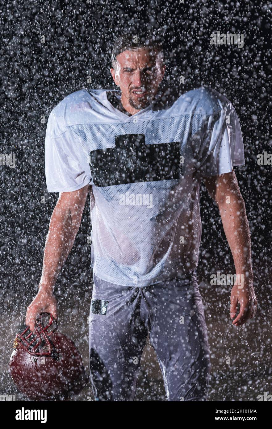 American Football Field: Lonely Athlete Warrior Standing on a Field ...